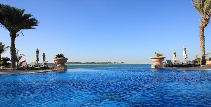 Over 40% Off at Al Raha Beach Hotel Villa Pool and Beach Access | Cobone